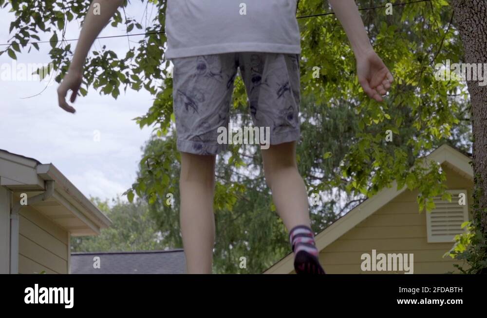 Kid jumping back view Stock Videos & Footage - HD and 4K Video Clips ...