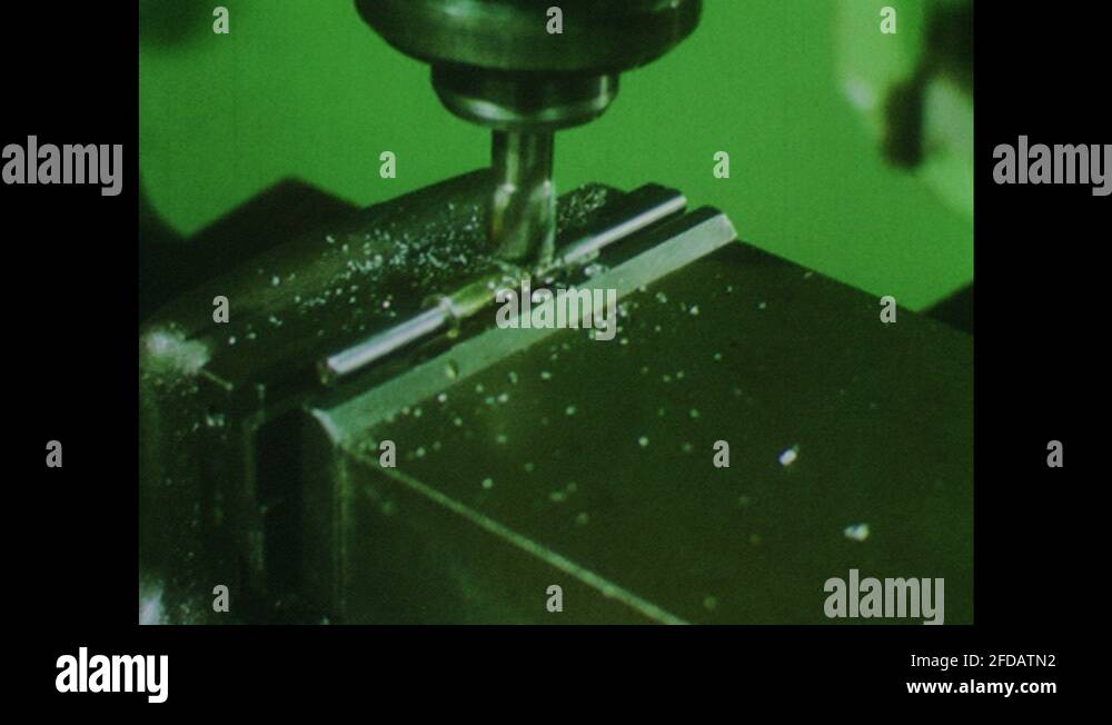 1970s: UNITED STATES: milling machine perfects metal design. Metal ...