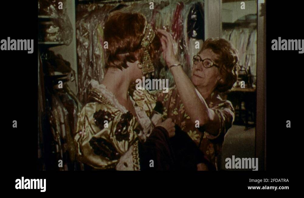 1970s: UNITED STATES: waitress in restaurant serves customer. Lady in ...