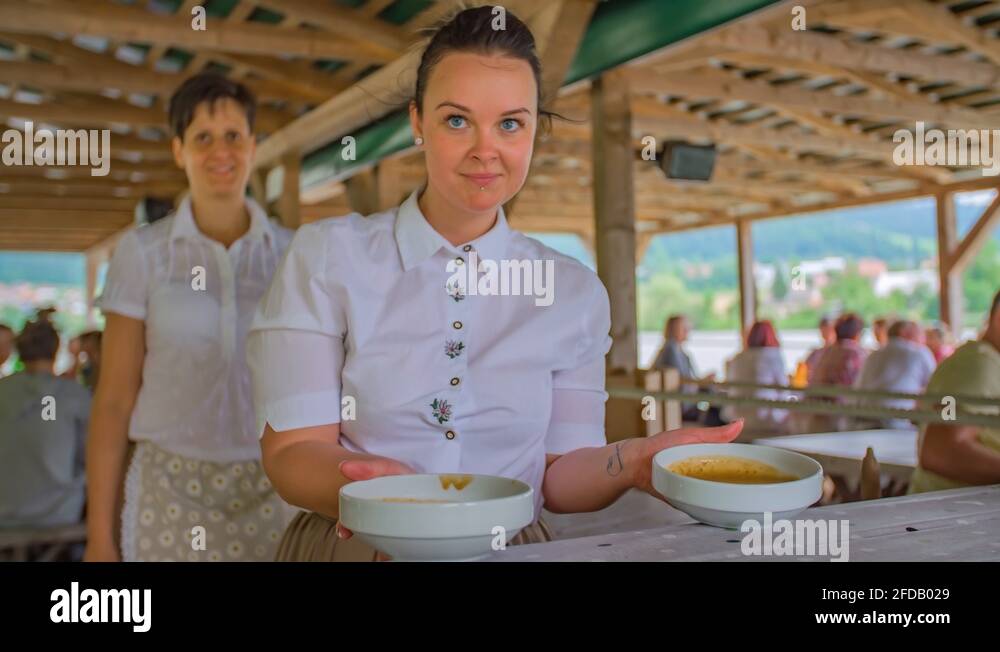 Pretty young female waitress serving Stock Videos & Footage - HD and 4K Video Clips - Alamy