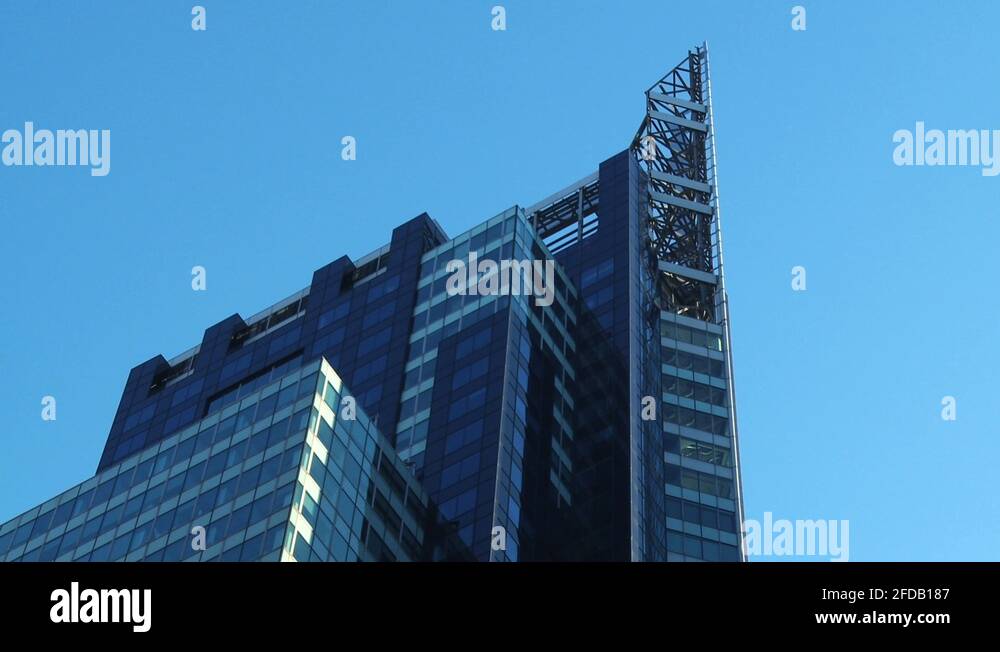 Tall building, modern architecture with sharp angles and peak against ...