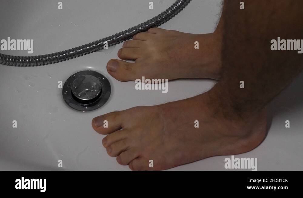 Washing away sinful blood in the bathtub in psycho style, closeup Stock ...