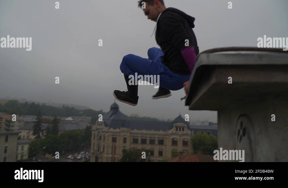 Jumping off roof Stock Videos & Footage - HD and 4K Video Clips - Alamy