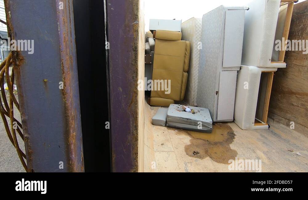 Skip container Stock Videos & Footage - HD and 4K Video Clips - Alamy