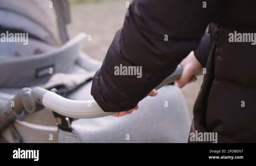 Woman pushing baby in pushchair buggy Stock Videos & Footage - HD and ...