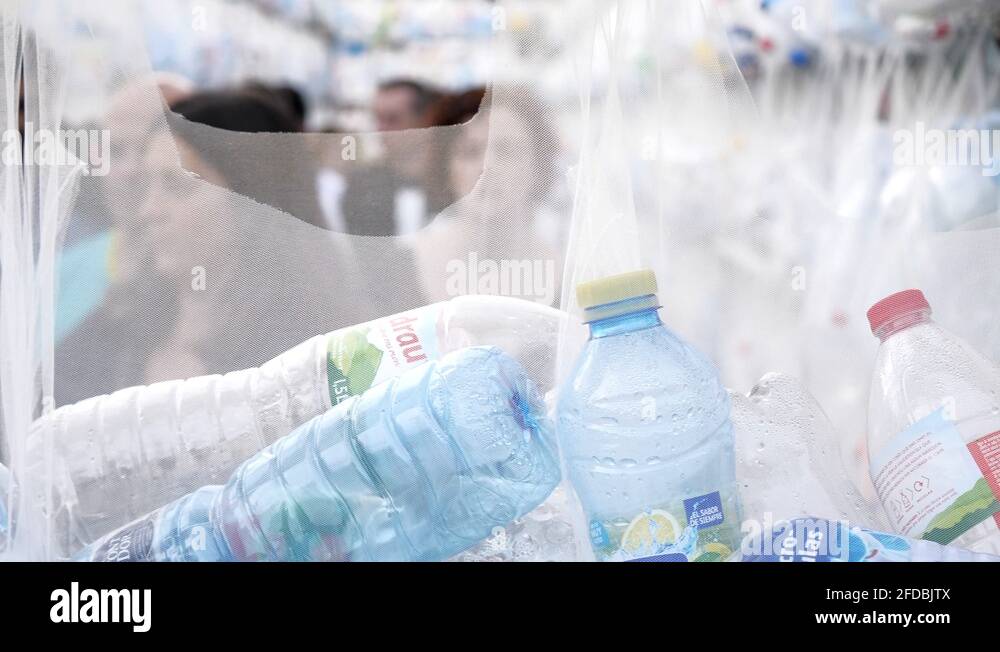 A maze made with plastic bags filled with empty plastic bottles during ...