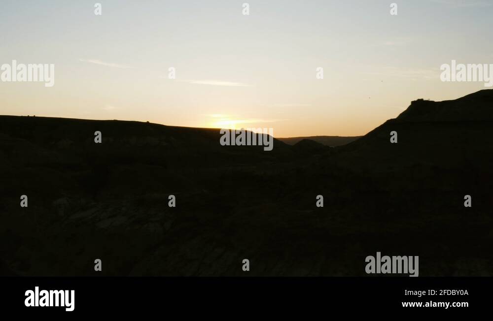 Sunrise behind cliffs Stock Videos & Footage - HD and 4K Video Clips ...