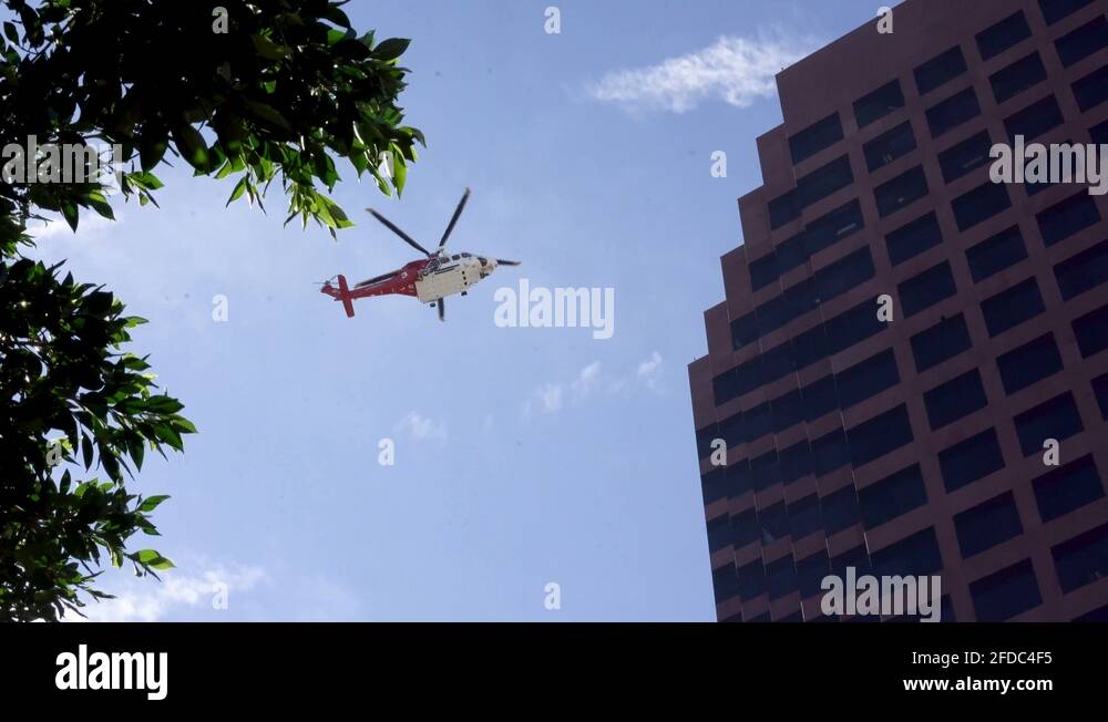 LAFD Fire Helicopter landing on skyscraper Stock Video Footage - Alamy