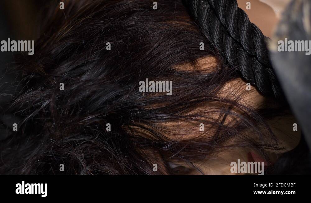 Close up of woman's head in a noose hanging upside down Stock Video ...
