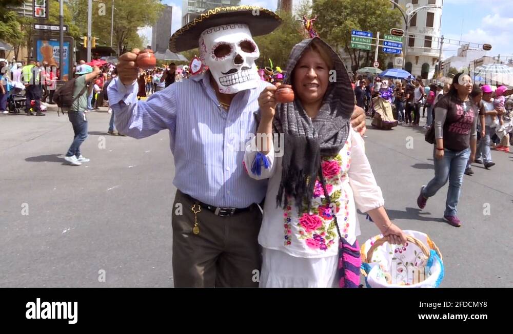 catrin and catrina walking during mexican parade of day of the death ...
