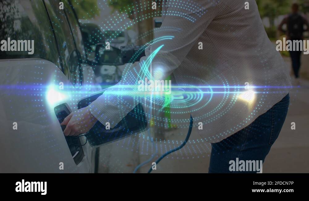 Woman charging an electric car with scope scanning and glowing Stock ...