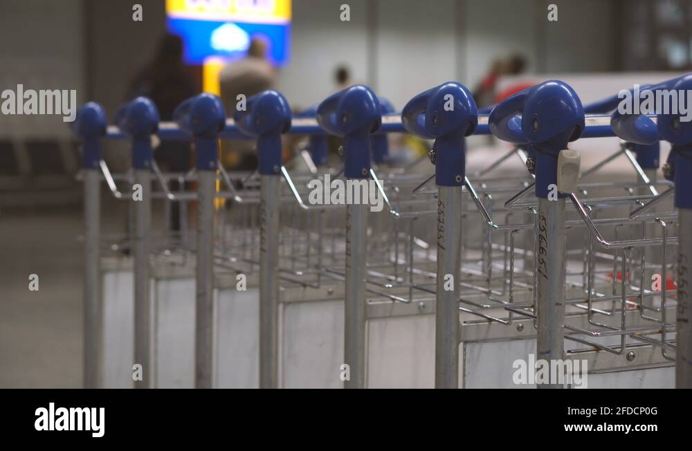 Woman luggage trolley Stock Videos & Footage - HD and 4K Video Clips ...