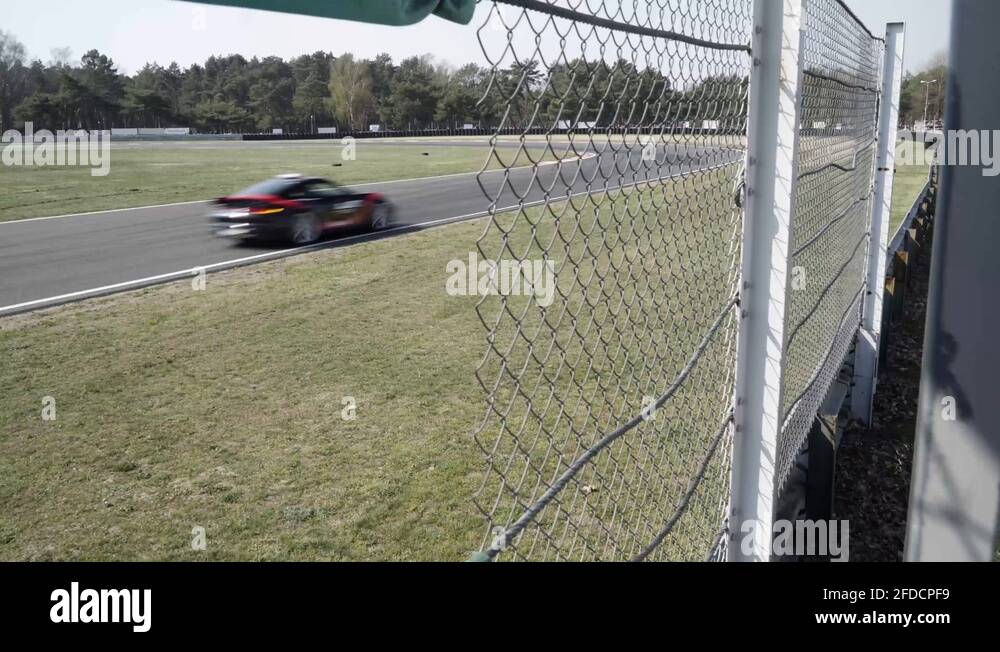 Race car driving on track with crowd Stock Videos & Footage - HD and 4K ...