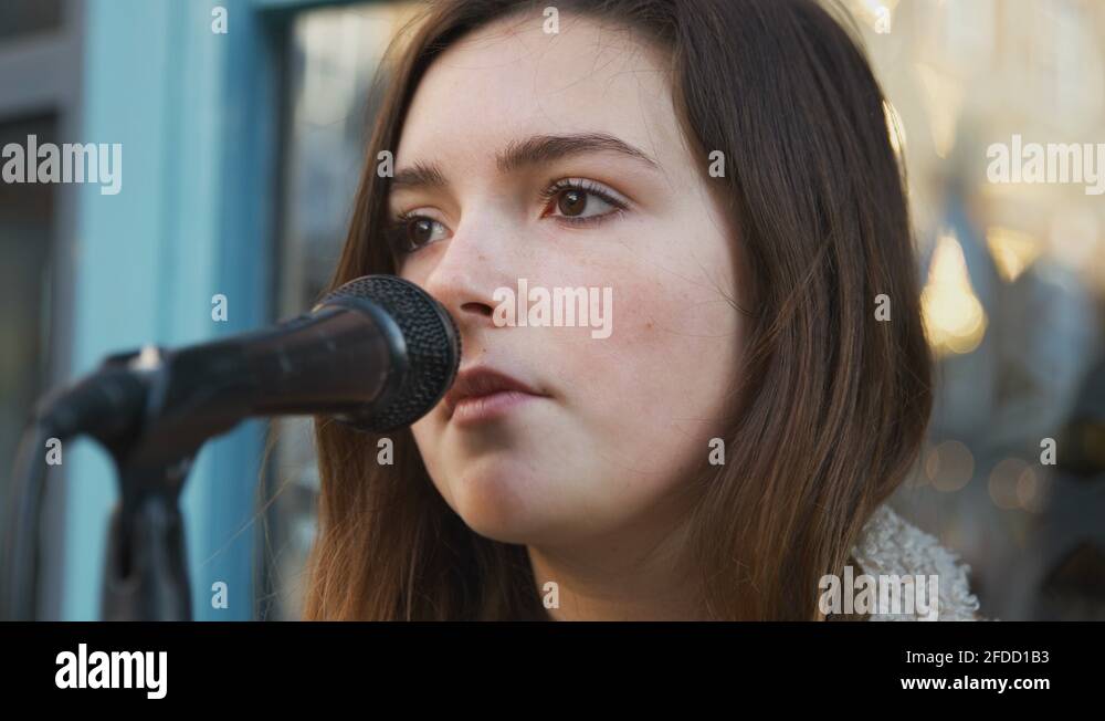 Busker woman singing busking Stock Videos & Footage - HD and 4K Video ...