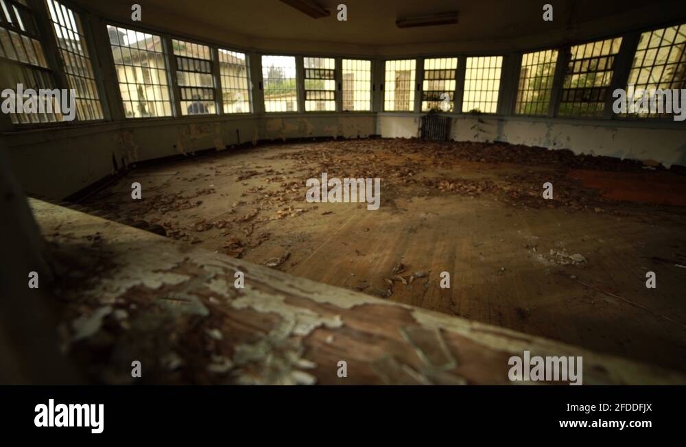 Slow pull through, from inside through a pane of glass to the exterior ...