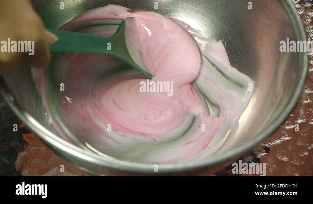 Mixing Red Food Color With Glue To Make Slime Stock Video Footage Alamy mixing-red-food-color-with-glue-to-make-slime-stock-video-footage-alamy