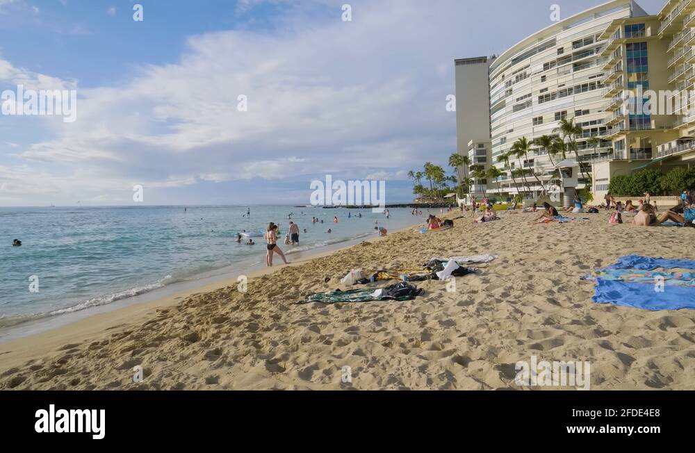 Waikiki Beach, Hawaii - People Having Fun On The Beach Under The Heat ...