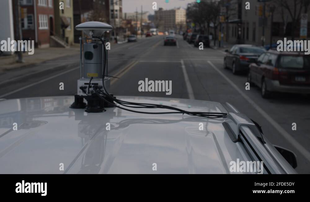 Car mounted view of autonomous LIDAR street mapping deviceing through ...
