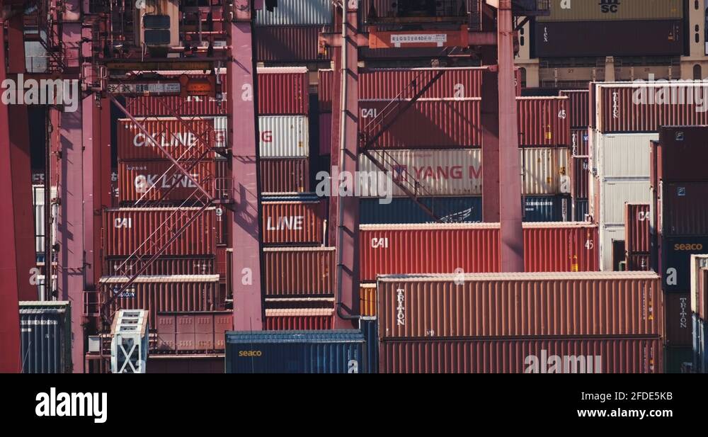 Container loading in a Cargo freight ship with industrial crane ...