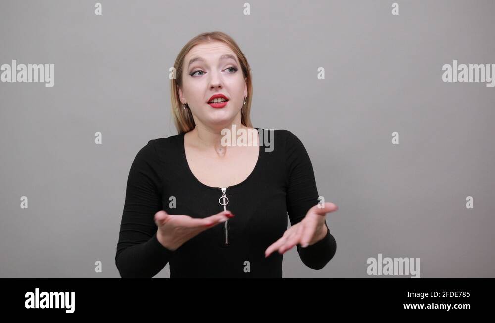 Angry Woman Chokes Herself Holds Her Throat With Hands And Pulls Out