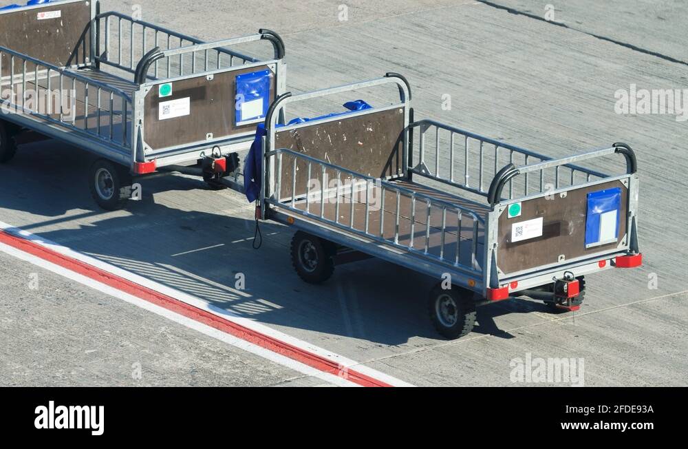 Loading luggage carts Stock Videos & Footage - HD and 4K Video Clips ...