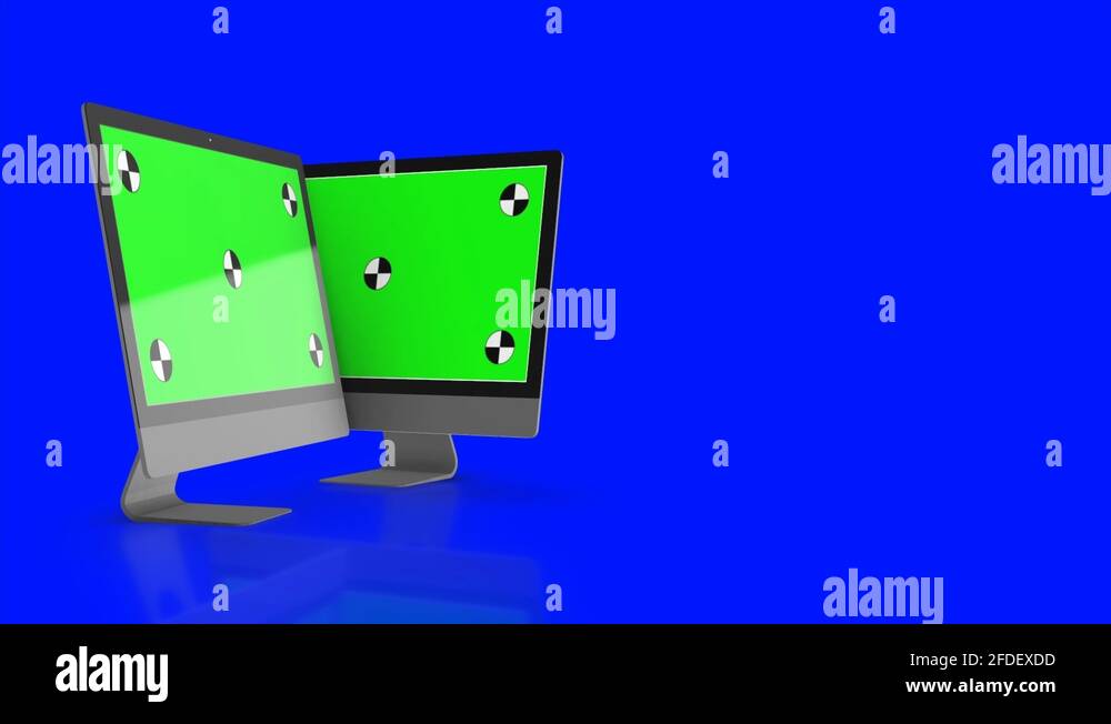 Two Modern computers with green screen, isolated on blue background ...