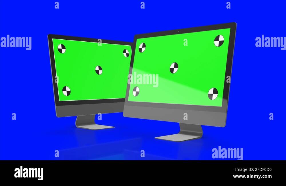 Two Modern computers with green screen, isolated on blue background ...