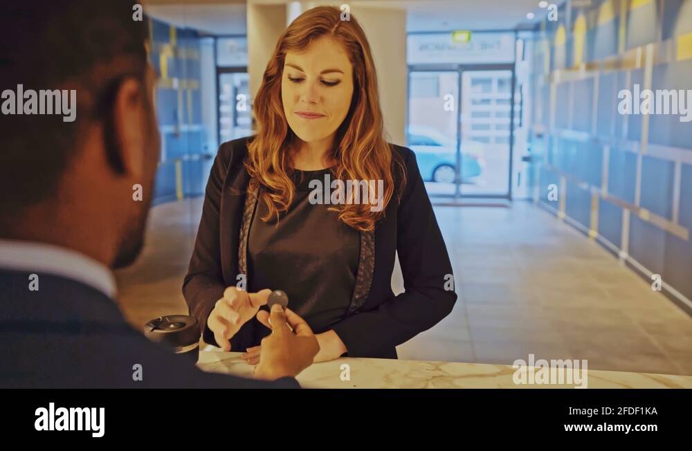 Black hotel receptionist Stock Videos & Footage - HD and 4K Video Clips ...