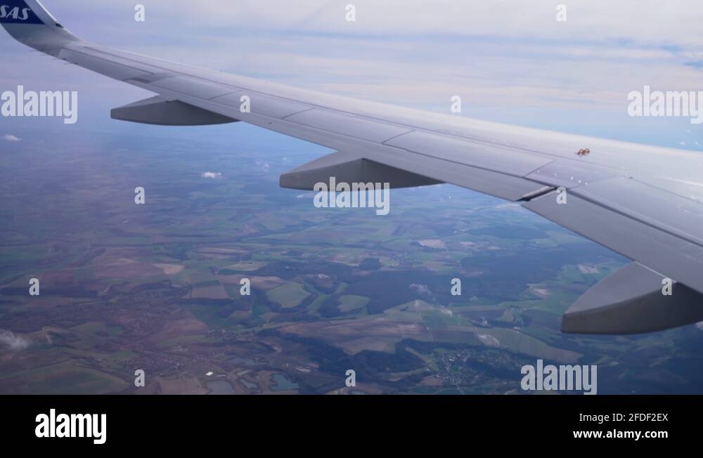 airplane wing flying view passenger seat inside aircraft Stock Video ...