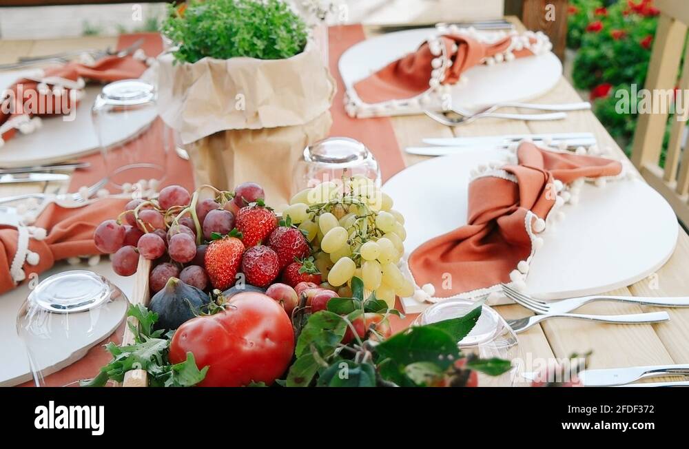 Tomato-themed wedding dining table Stock Video Footage - Alamy