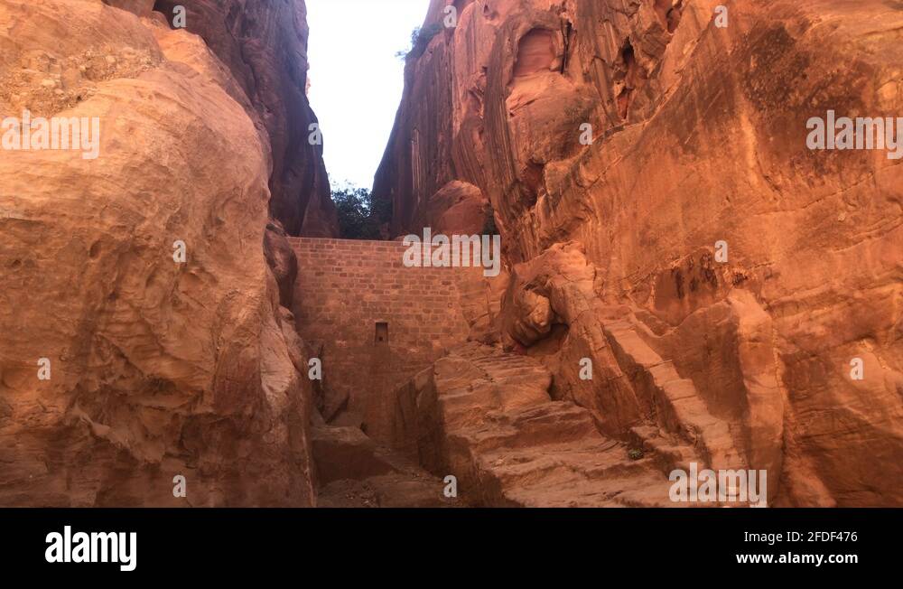 Petra, Jordan - mountain reliefs with structures carved into the rocks ...