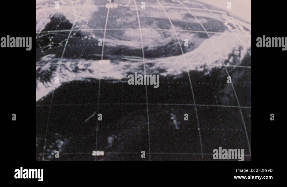 1970s: Satellite image of clouds moving over Earth. Different satellite ...