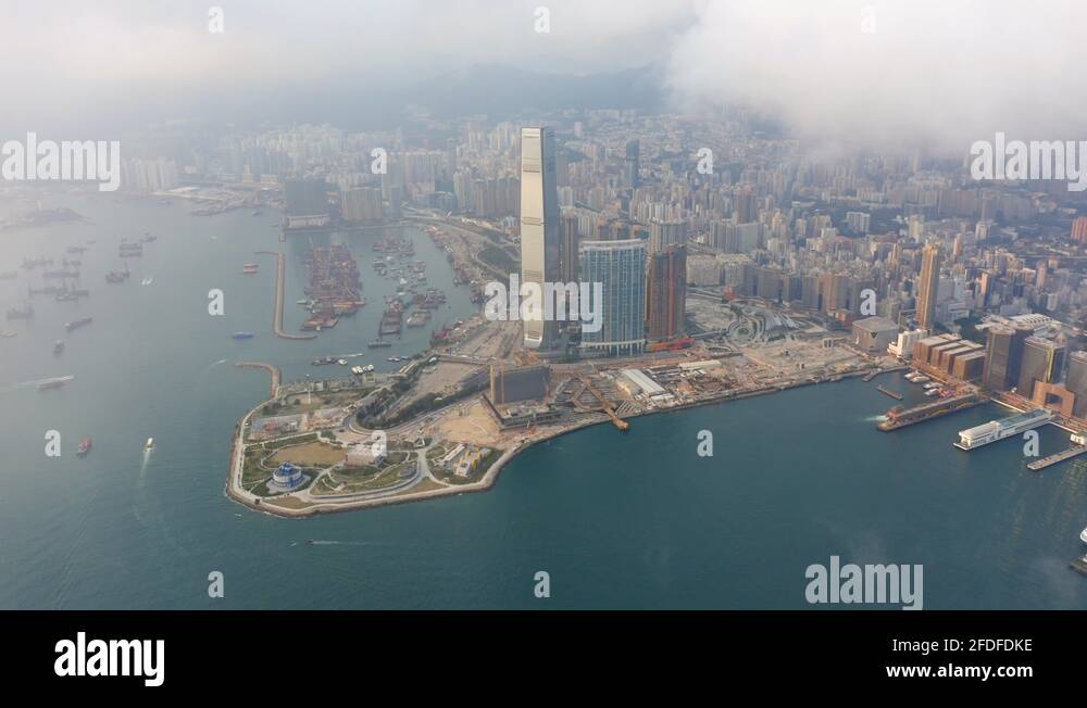 Victoria harbour and Kowloon aerial with clouds, Hong Kong Stock Video ...