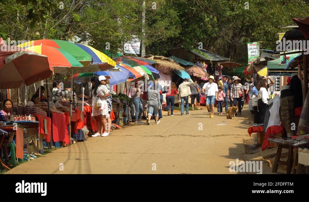People walking in Local street market in tourist attraction spot in Mon ...