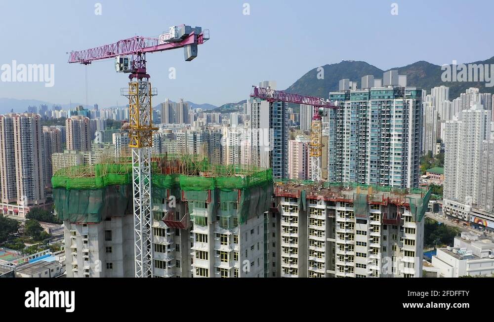 Mega Building Construction site in downtown Hong Kong, Pull up tilt ...