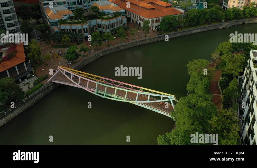 sunset singapore center river pedestrian bridge aerial topdown panorama ...