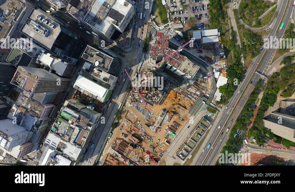 Mega Building Construction site in downtown Hong Kong, Pull up tilt ...