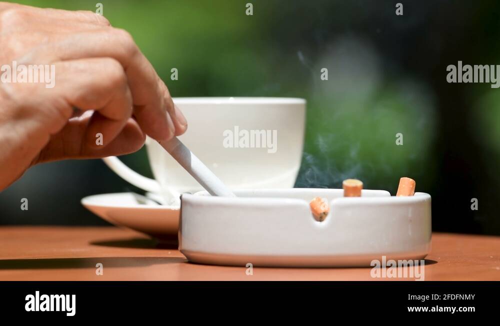Man smoking cigarette drinking coffee Stock Videos & Footage - HD and ...