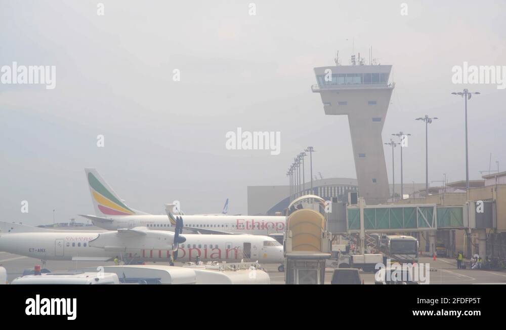 Addis Ababa airport terminal control tower, Ethiopian Airlines airplanes Stock Video Footage - Alamy