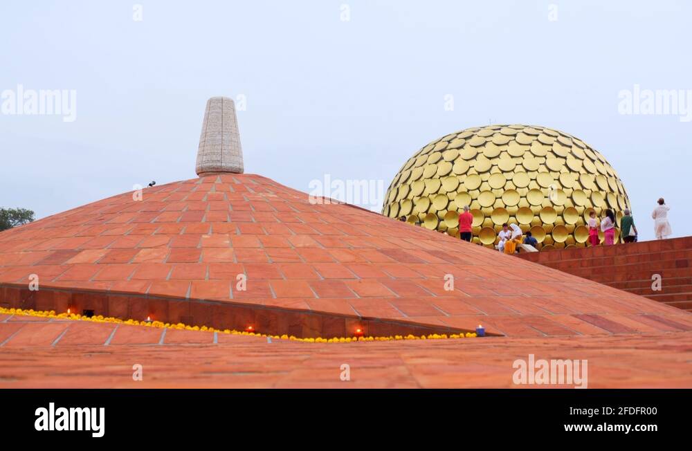 Auroville birthday ceremony, Matrimandir temple amphitheater urn, India ...