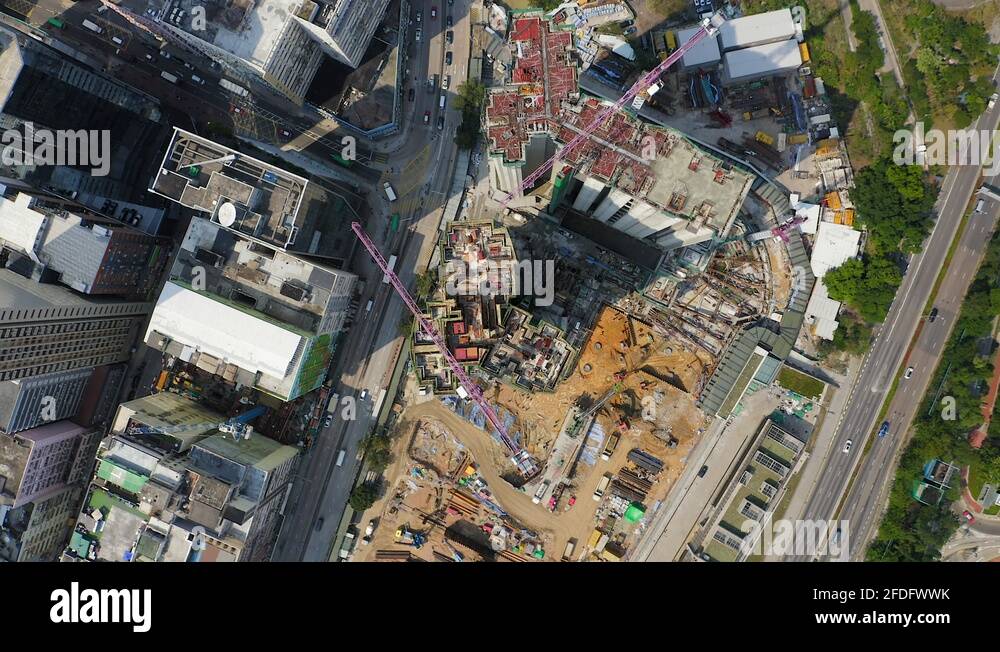 Mega Building Construction site in downtown Hong Kong, Pull up tilt ...
