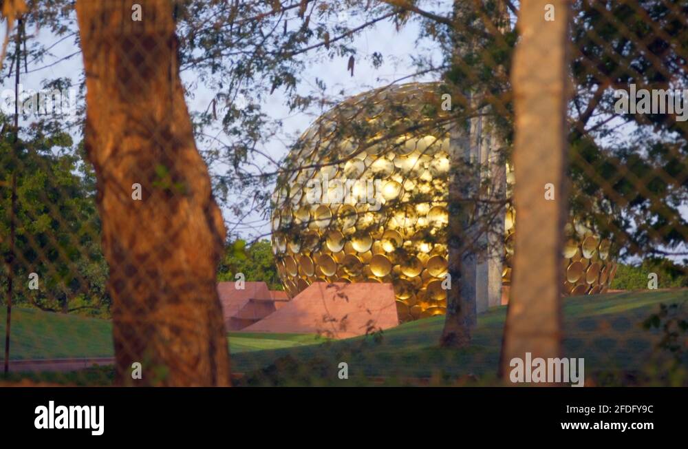 Matrimandir, Temple of The Mother, behind fence, spiritual center of ...