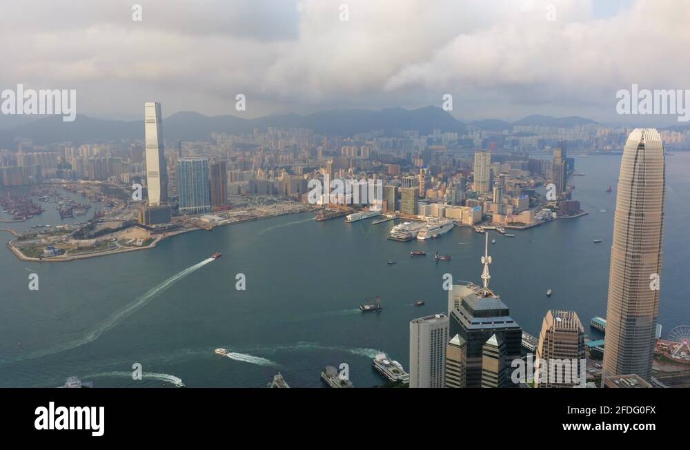 Victoria harbour and Kowloon aerial with clouds, Hong Kong Stock Video ...