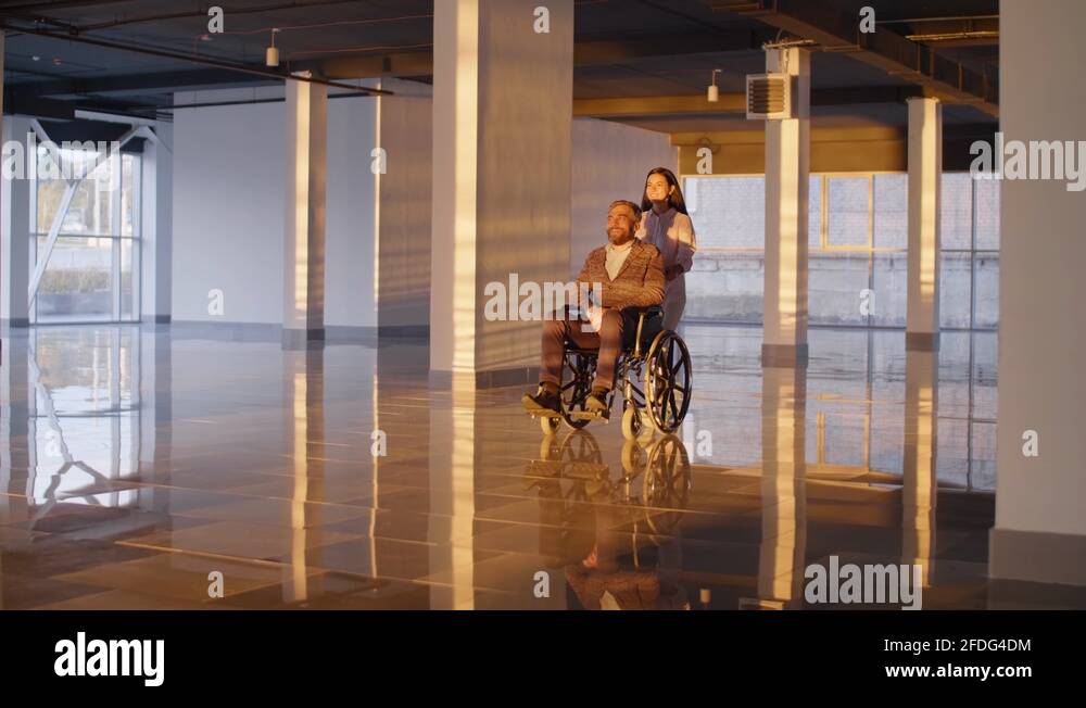 Girl pushing wheelchair Stock Videos & Footage - HD and 4K Video Clips ...