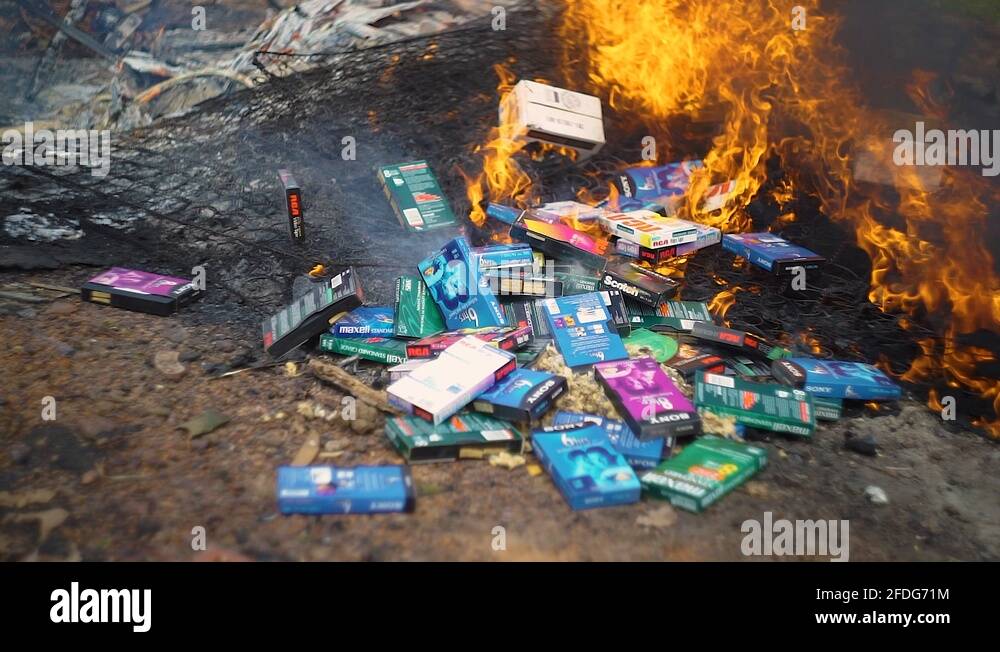 [60fps] Burning Massive Amounts of VHS Tapes in Bonfire Stock Video ...