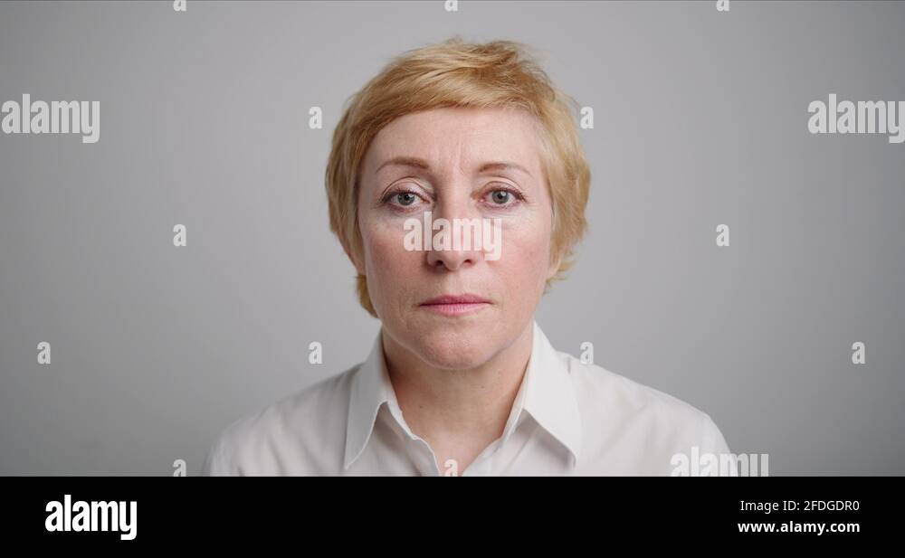 Mature woman face looking to camera Stock Videos & Footage - HD and 4K ...