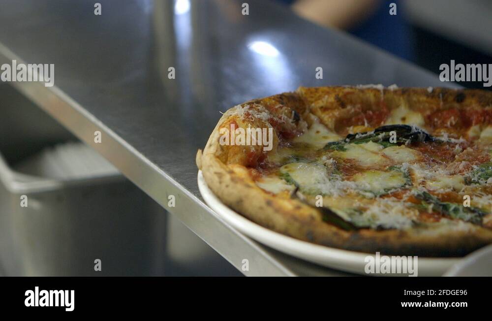 Ready to serve pizza Stock Videos & Footage - HD and 4K Video Clips - Alamy