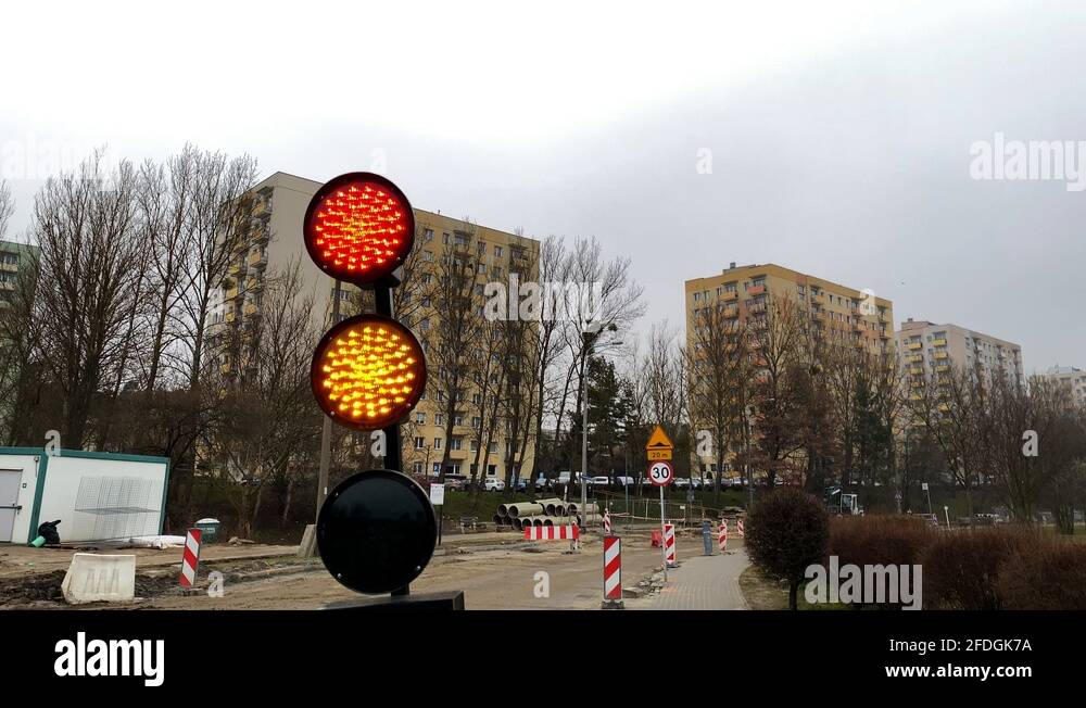Change the traffic lights from red to green. Swinging traffic on the ...