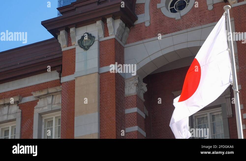 Japan flag with background of modern high-rise building in Tokyo,Japan ...