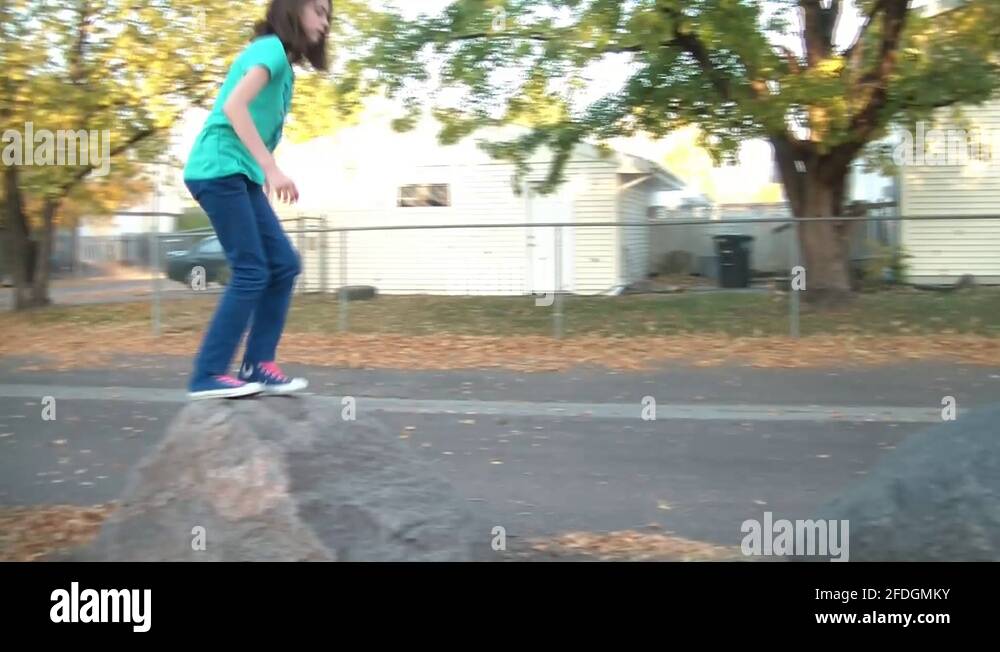 Jumping onto rocks Stock Videos & Footage - HD and 4K Video Clips - Alamy